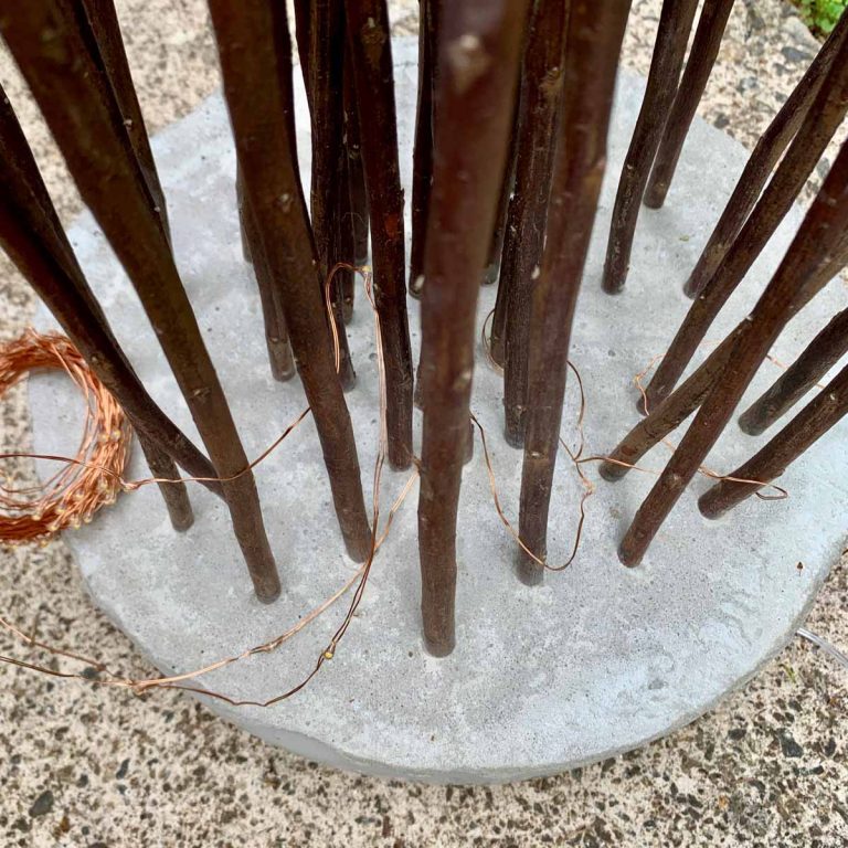 DIY Twig Lights Stand (in a Floating Concrete Base!) - Artsy Pretty Plants